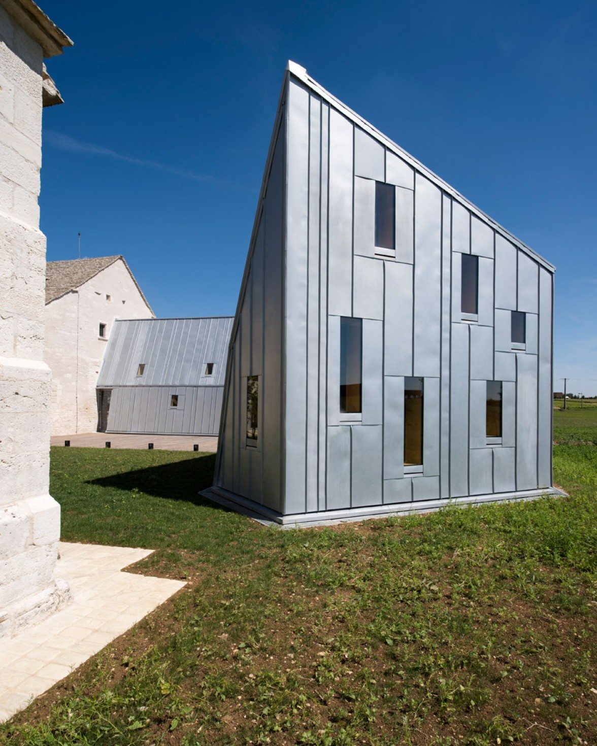 JUNG Architectures Adds Zinc-clad Extension To Former Leper Hospital ...